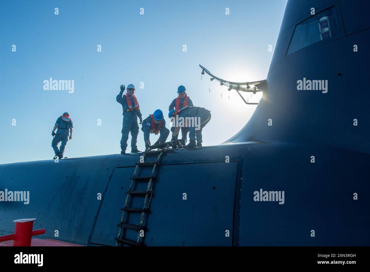 Sailors assigned Republic of Korea Navy submarine Lee Beom-Seok (SS-081 ...