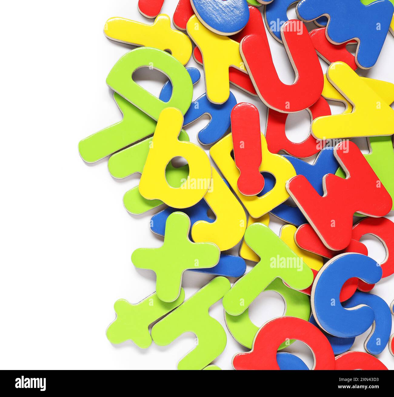 Alphabet. Many colorful magnetic letters isolated on white, top view ...