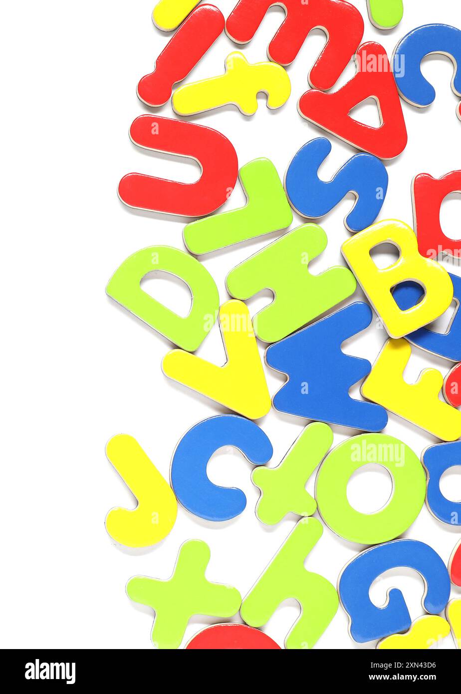 Alphabet. Many colorful magnetic letters isolated on white, top view ...