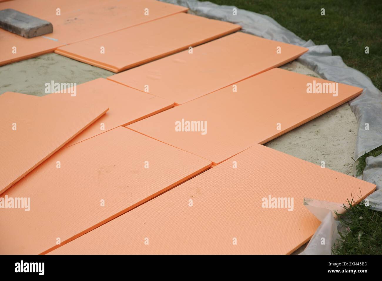 Under pool foam tiles on green grass in backyard Stock Photo - Alamy