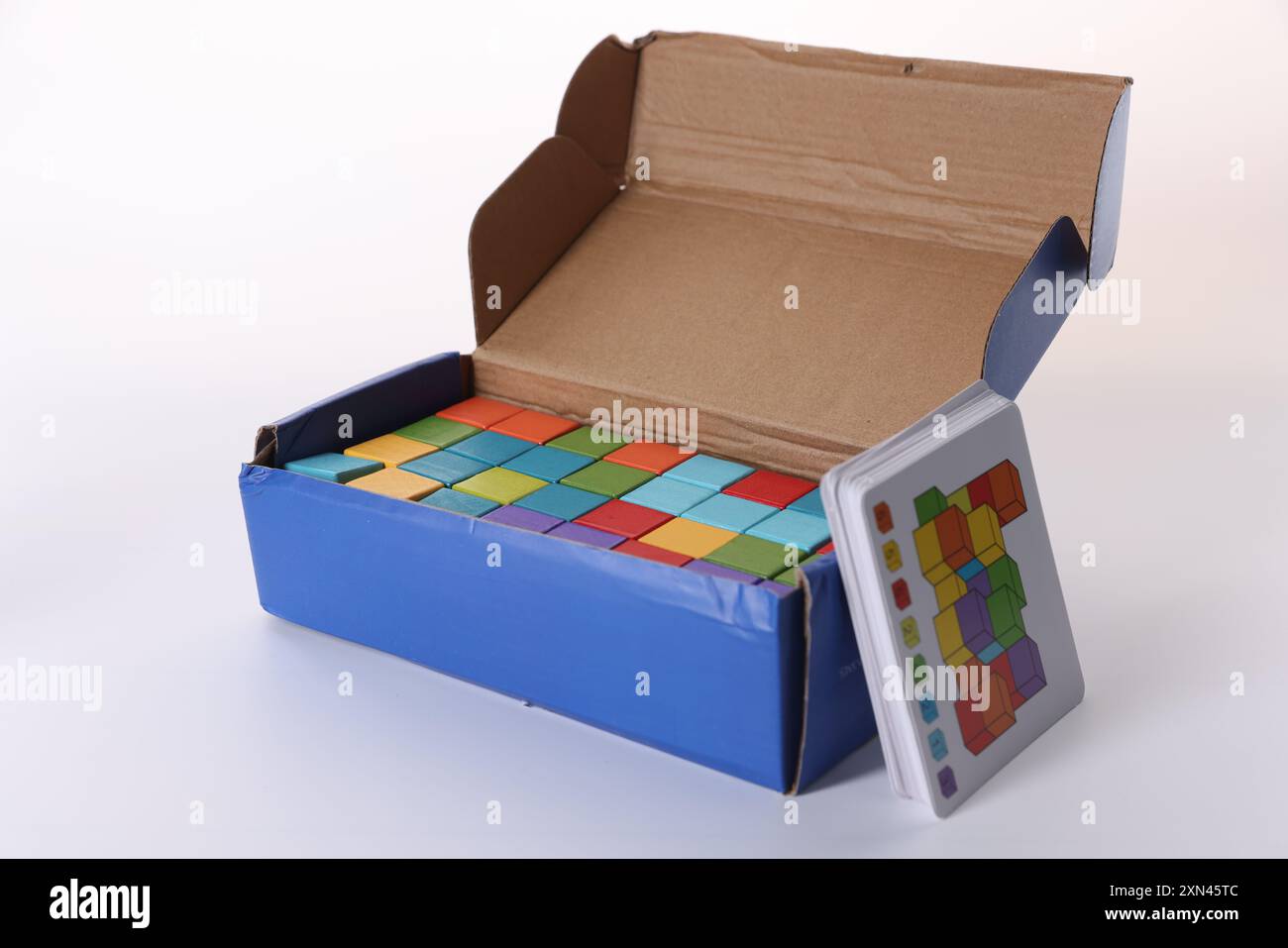 Set of colorful cubes in box isolated on white Stock Photo - Alamy
