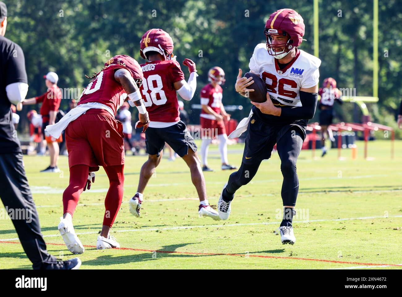 Washington Commanders tight end Zach Ertz (86) and safety Tyler Owens ...