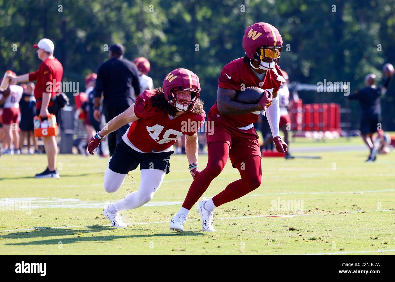 Washington Commanders safety Dominique Hampton (45) and safety Ben ...