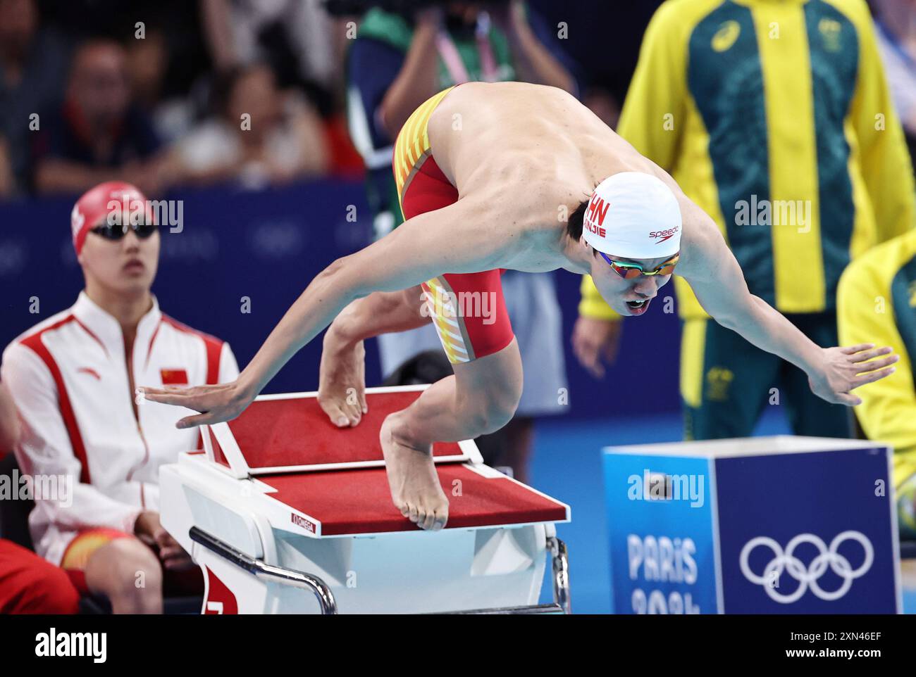 Paris, France. 30th July, 2024. Ji Xinjie of team China dives into the ...