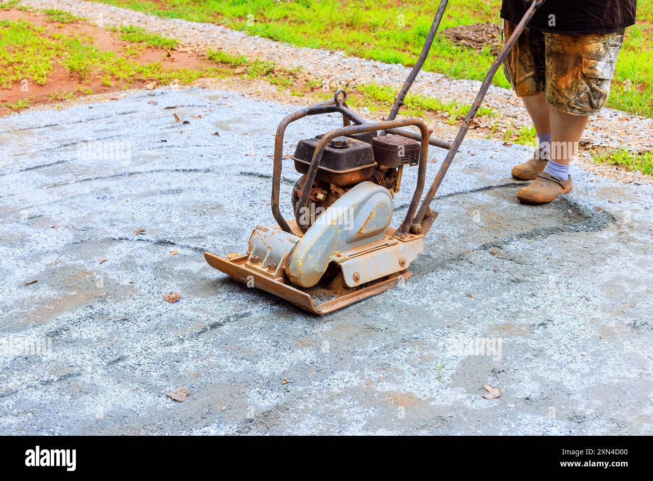 Compaction of sand by vibratory tamping machine during construction of ...