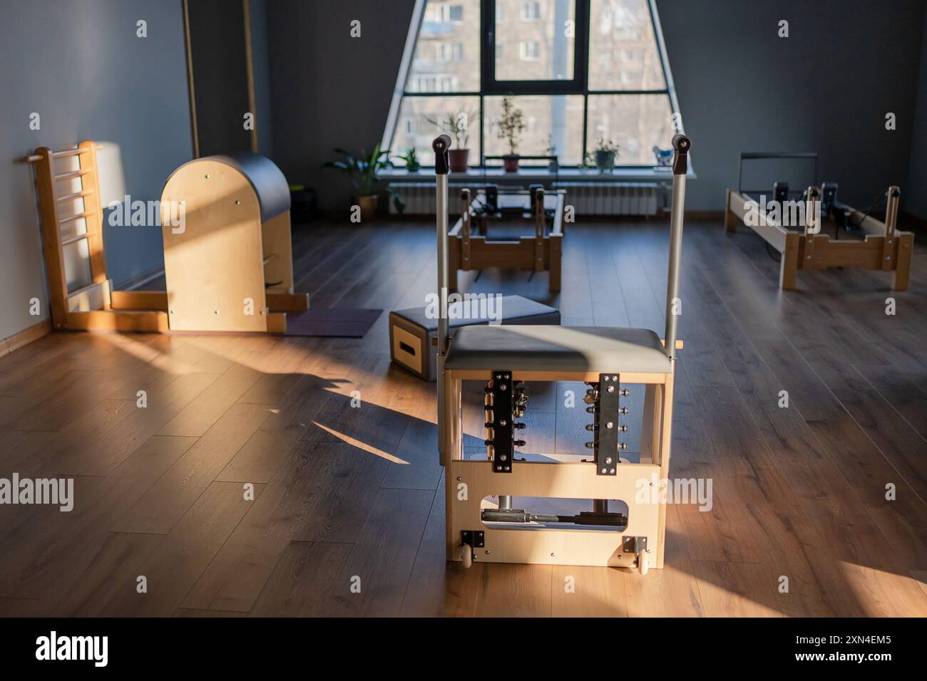 Pilates reformer, Chair and Balanced Body Ladder Barrel equipment in a ...