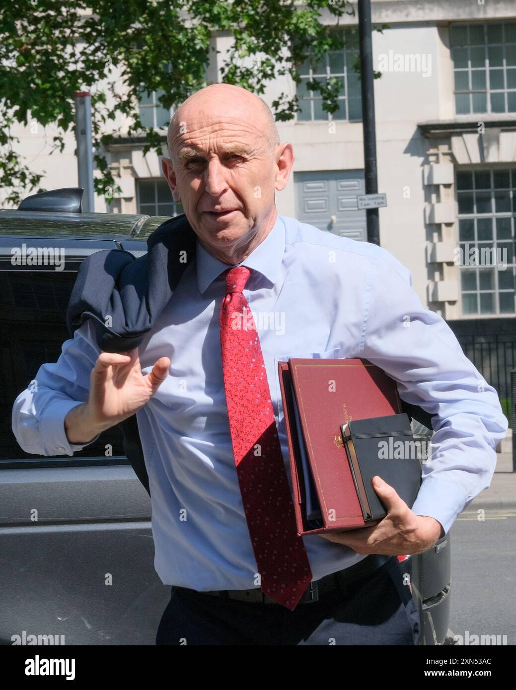 John Healey MP, Secretary of State for Defence arrives in Whitehall for a meeting at the Cabinet ...