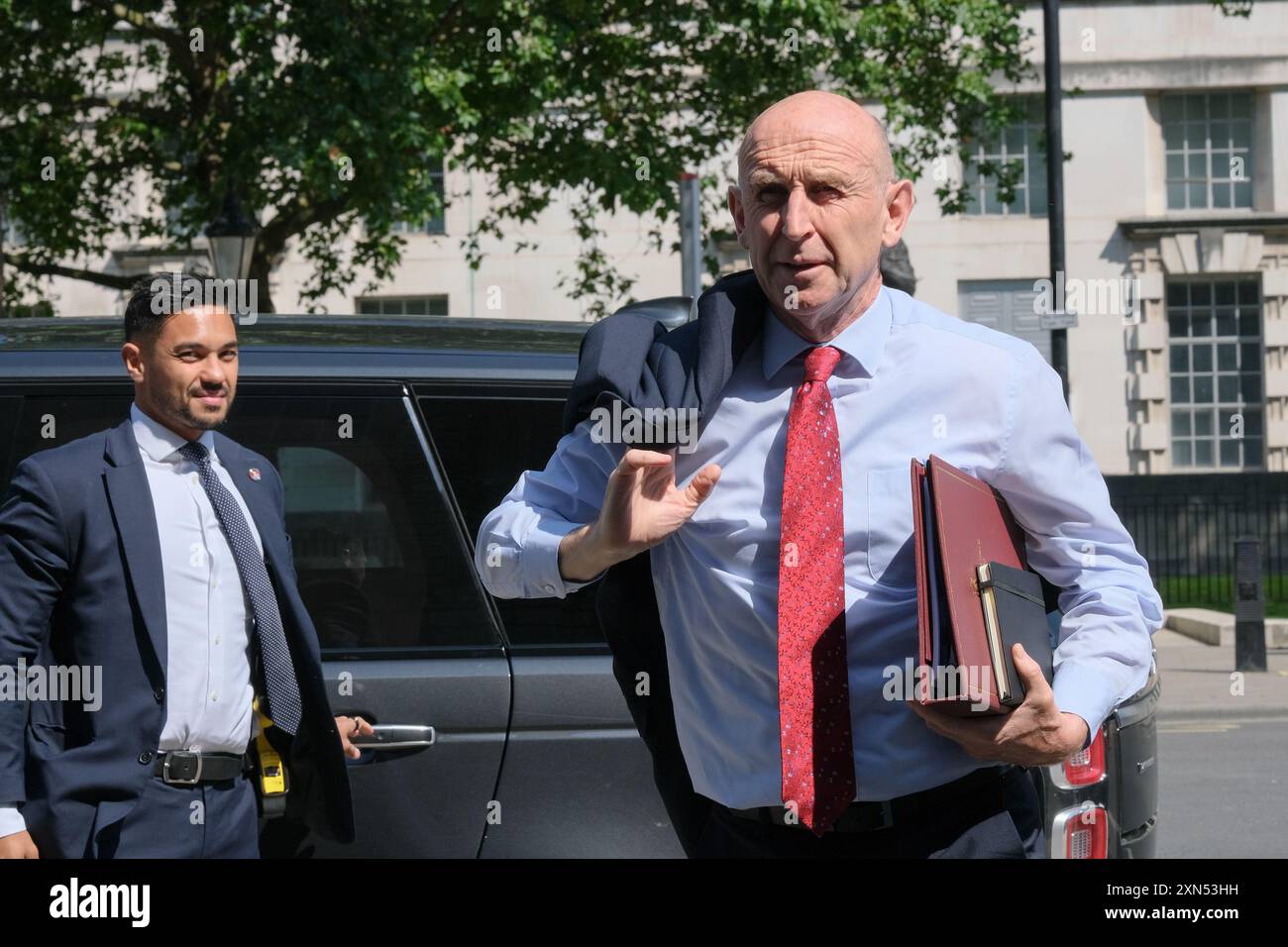 John Healey MP, Secretary of State for Defence arrives in Whitehall for a meeting at the Cabinet ...