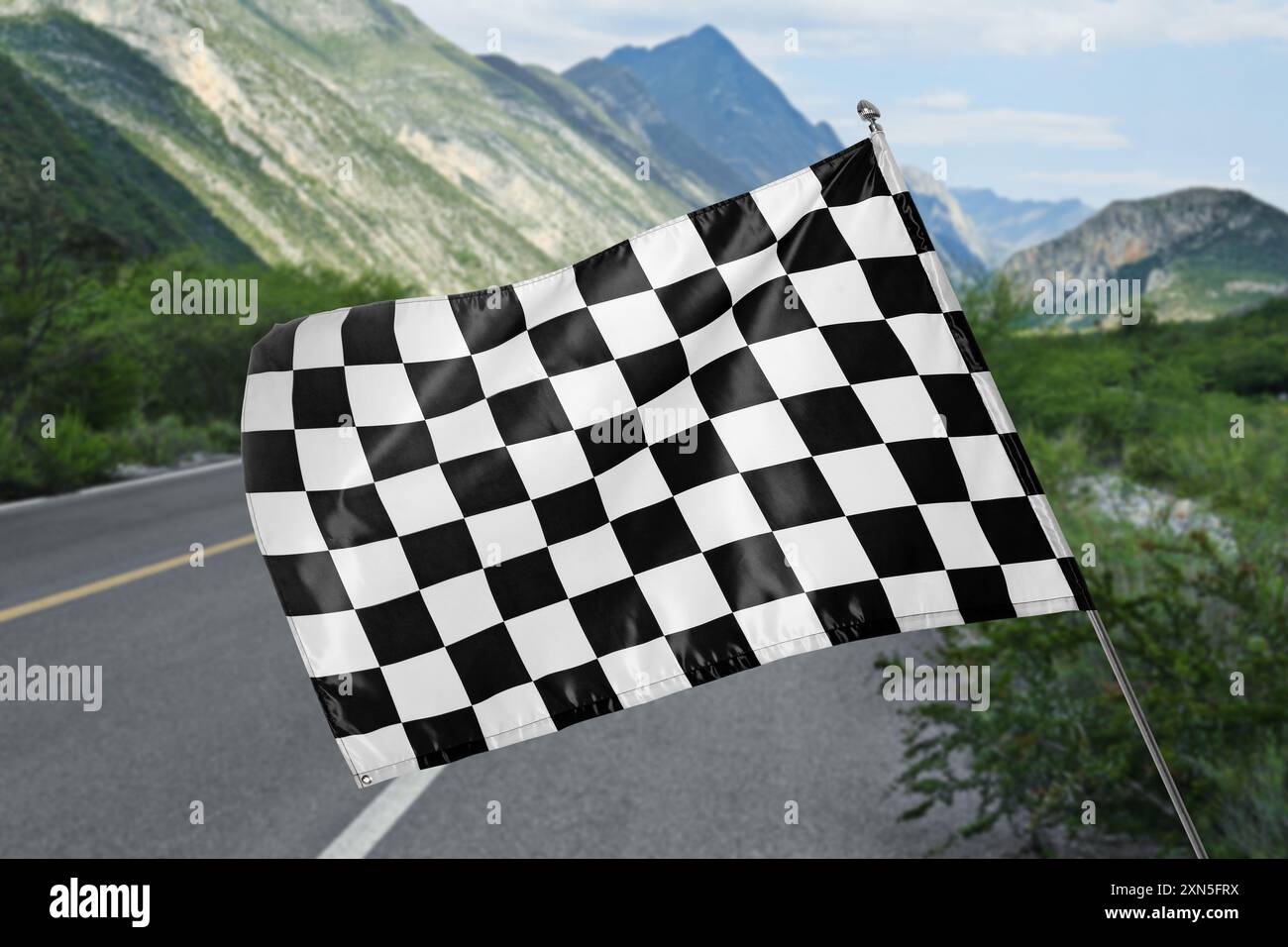 Checkered finish flag and asphalt racing track outdoors Stock Photo - Alamy