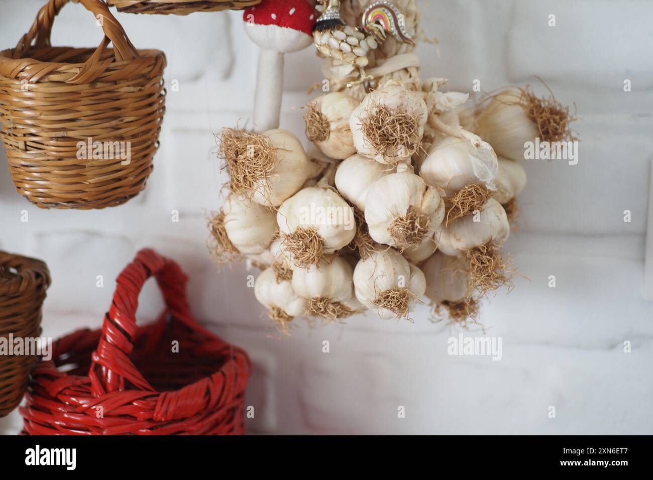 A beautiful Garlic Bunch is Hanging in the Kitchen as part of the Home ...
