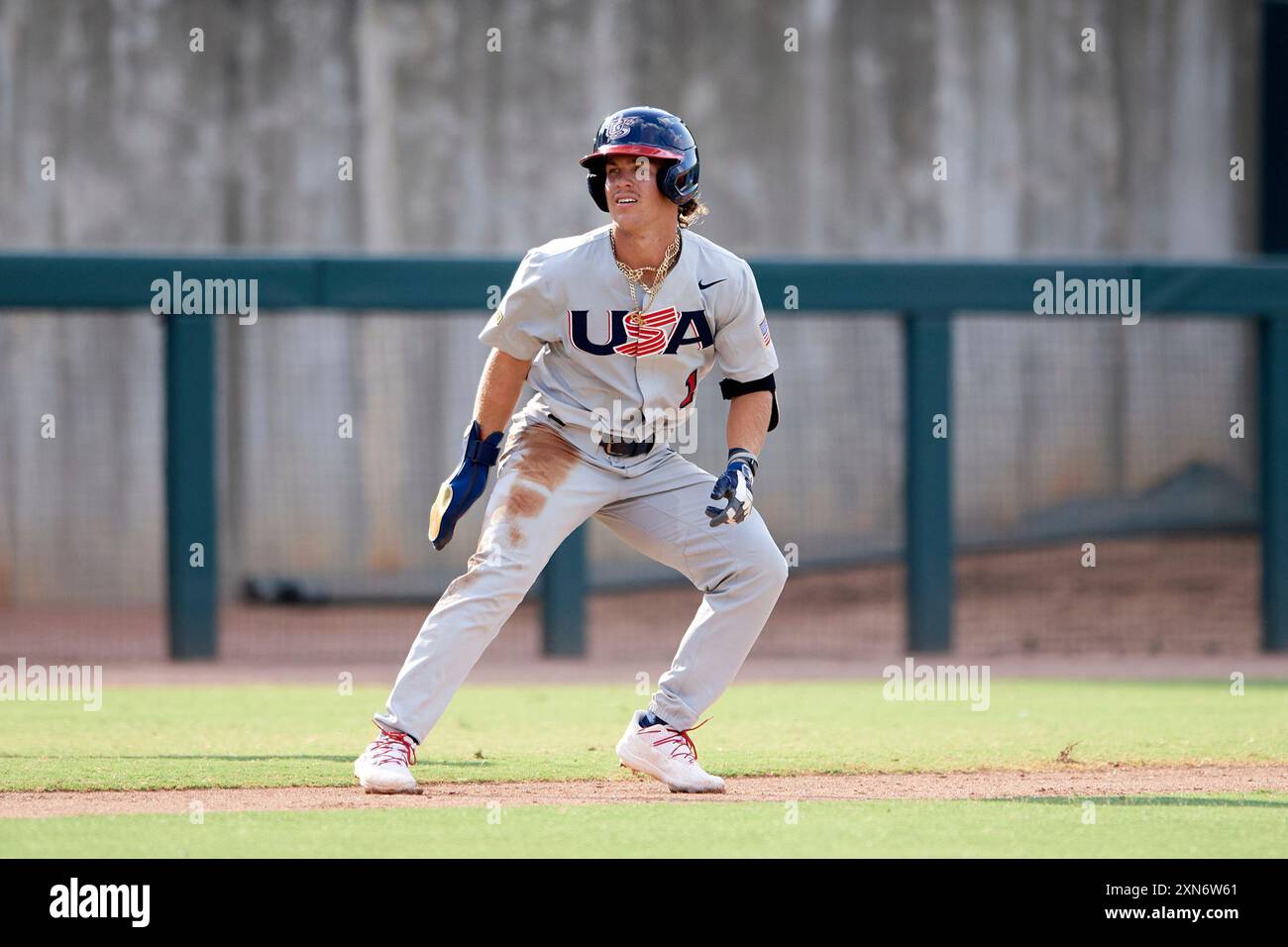 Drew Burress (1) (Georgia Tech) of Team Stripes leads off third base ...