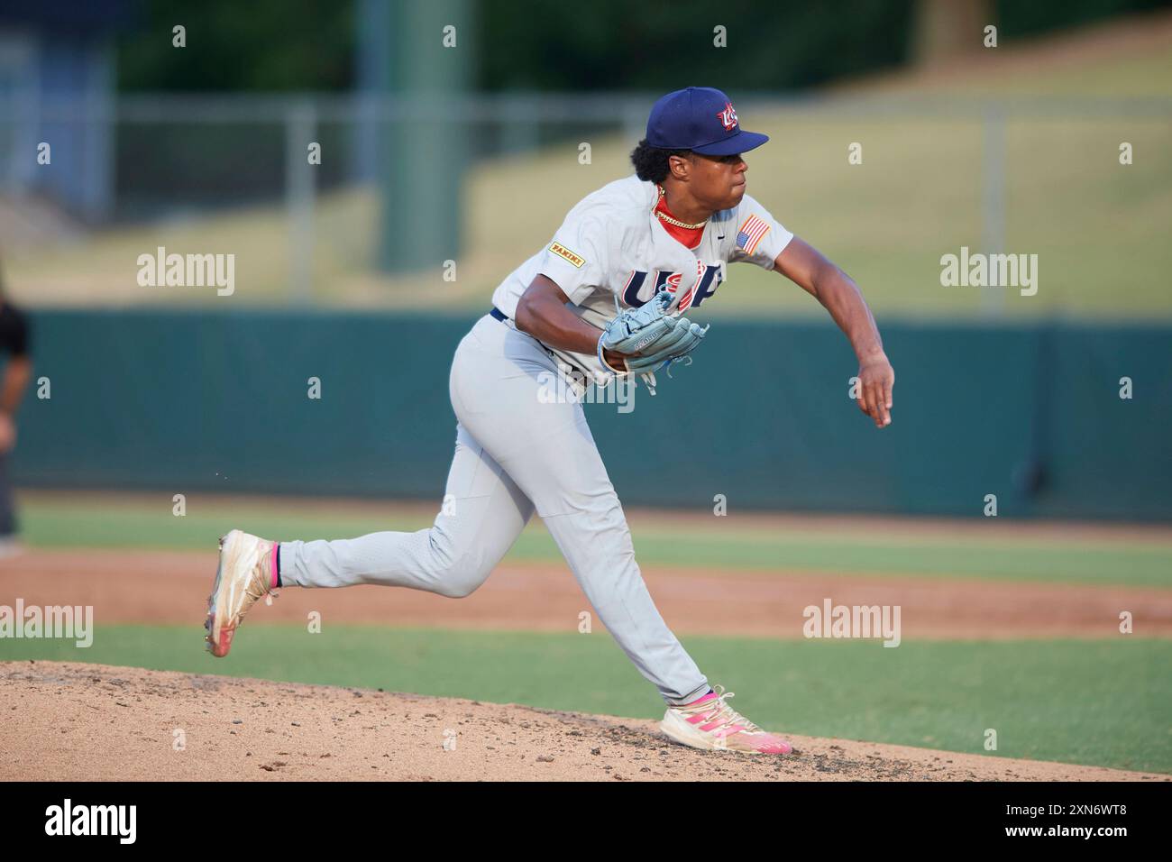 Kyle Johnson (11) (Duke) of Team Stripes delivers a pitch during a ...