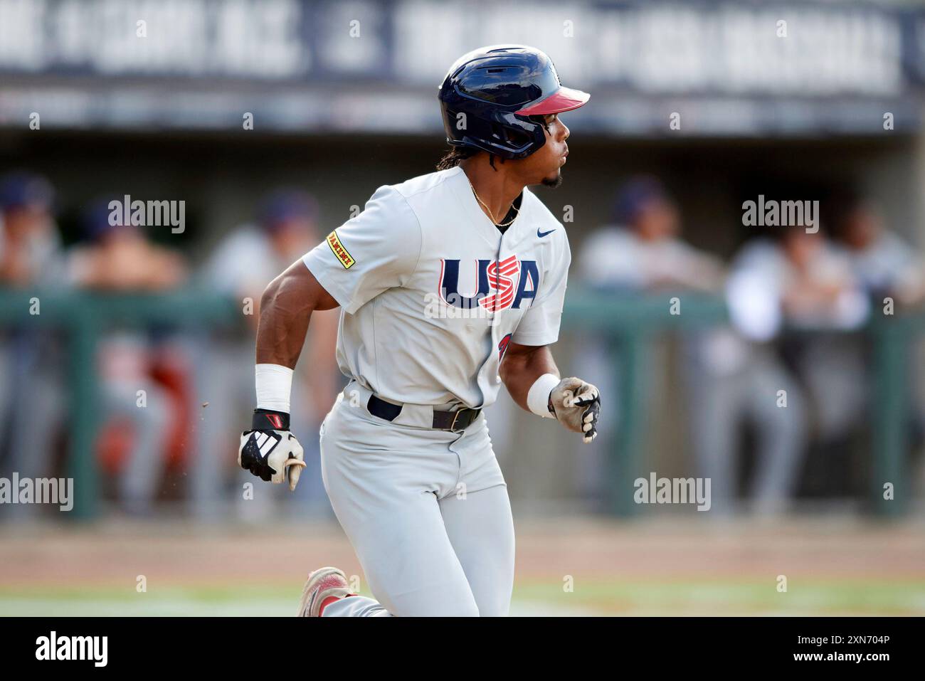 Zion Rose (32) (Louisville) of Team Stripes runs to first base during a ...