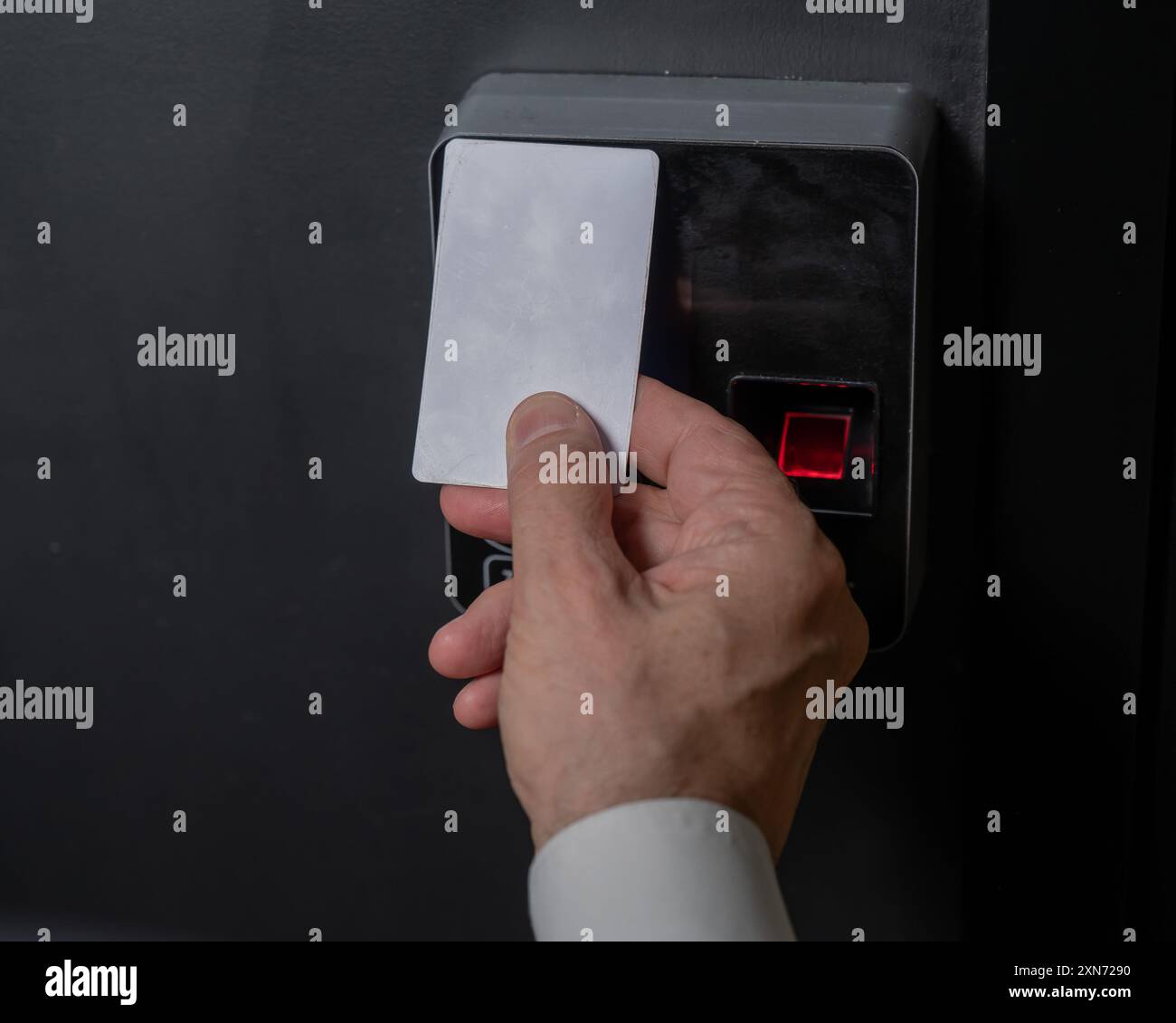 A man opens the door with a card. Modern electronic lock. Keyless Entry ...