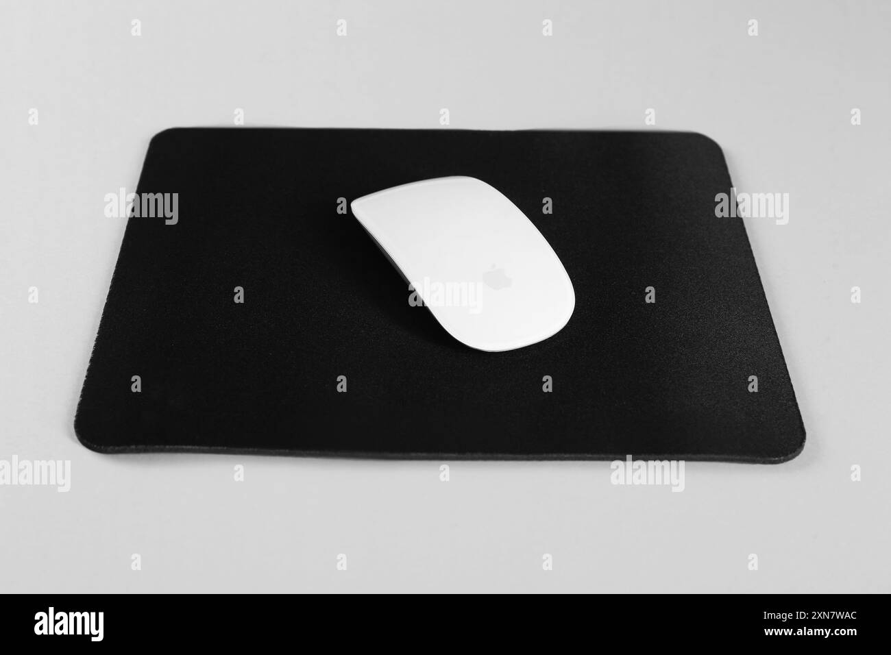 Wireless mouse and mousepad on white background Stock Photo - Alamy