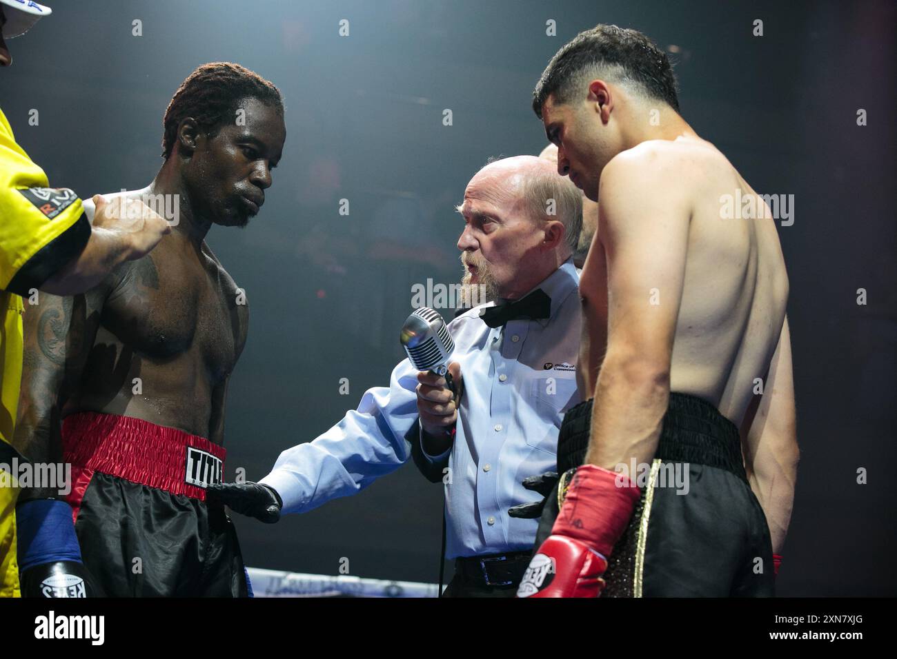 Antonia Scaringi (red gloves) faces Roddy Rene (black gloves) during a ...