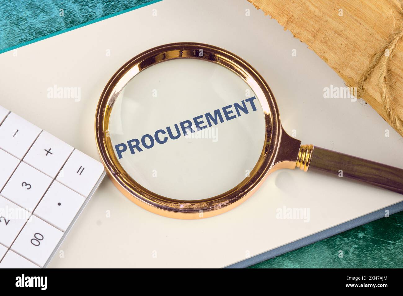Concept of procurement. PROCUREMENT appeared through a magnifying glass ...