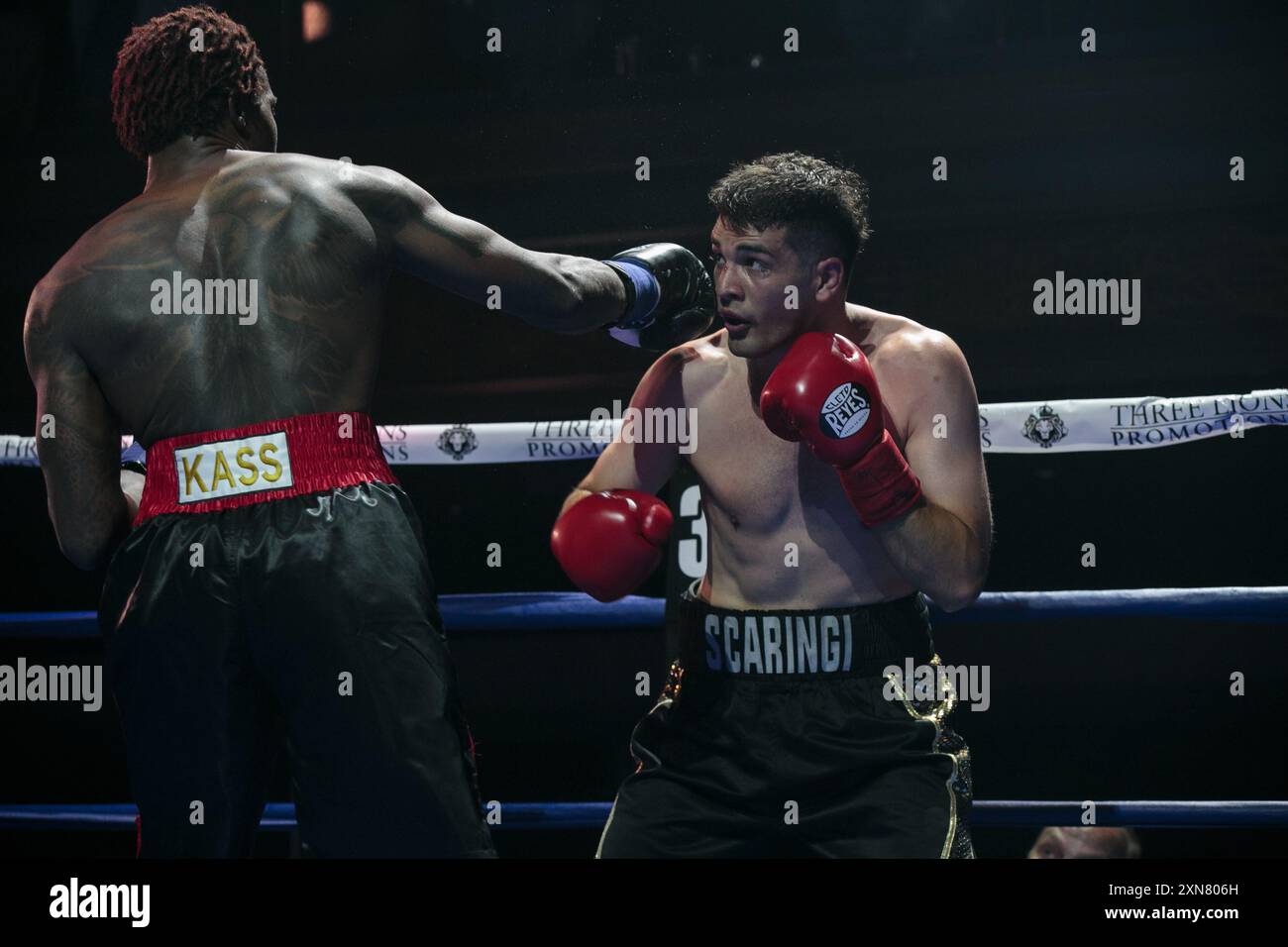 Antonia Scaringi (red gloves) faces Roddy Rene (black gloves) during a ...