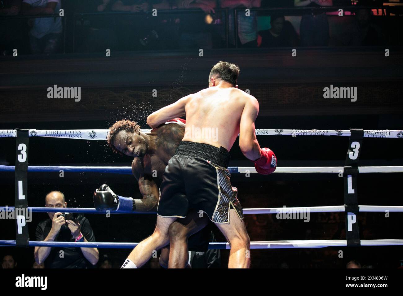 Antonia Scaringi (red gloves) faces Roddy Rene (black gloves) during a ...