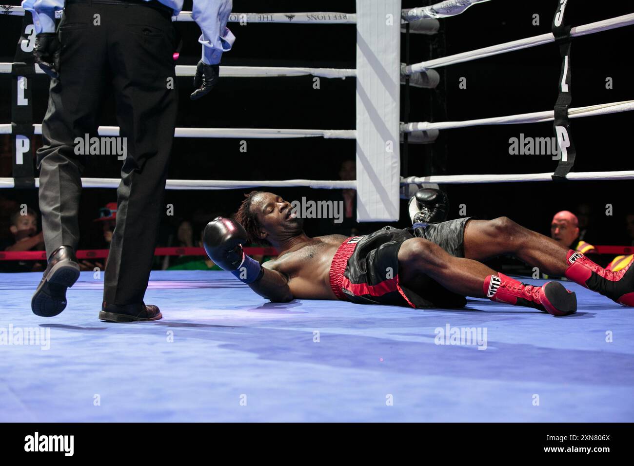 Antonia Scaringi (red gloves) faces Roddy Rene (black gloves) during a ...