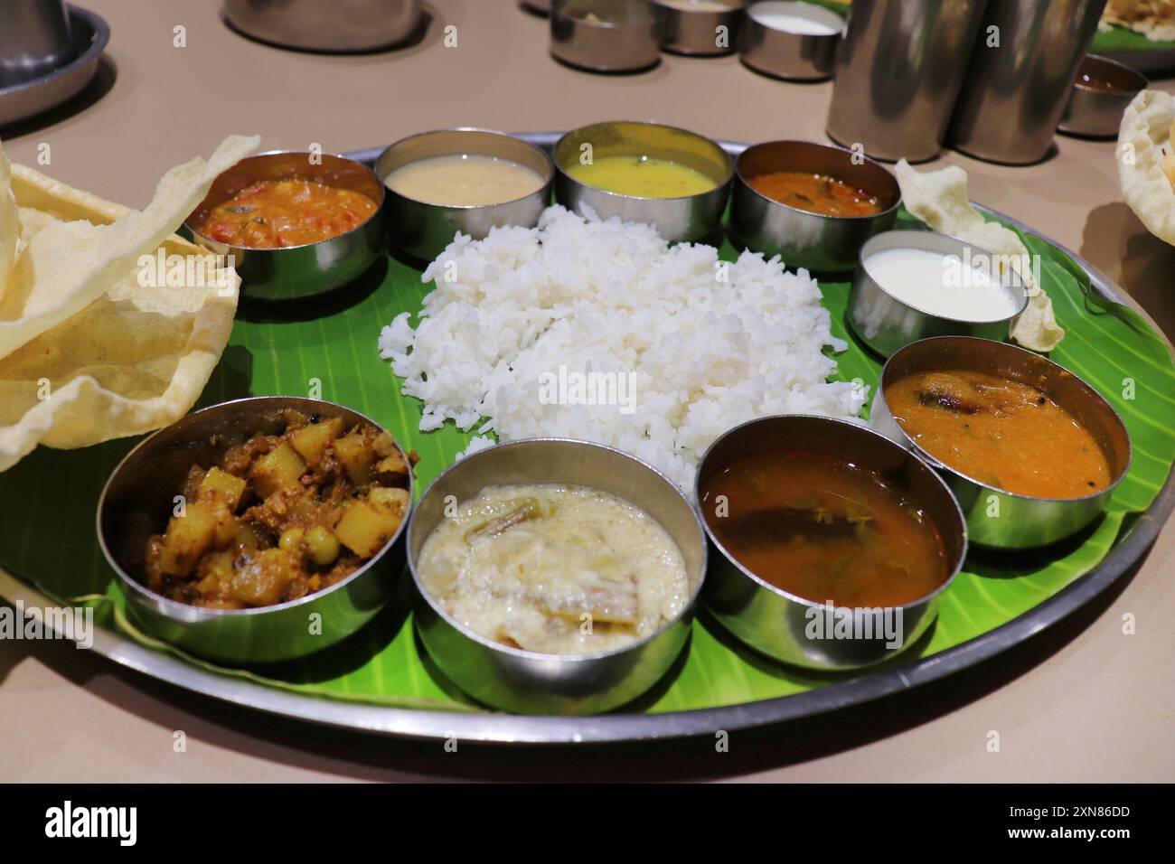 A South Indian thali or meal consists of steamed rice, sambar, rasam ...