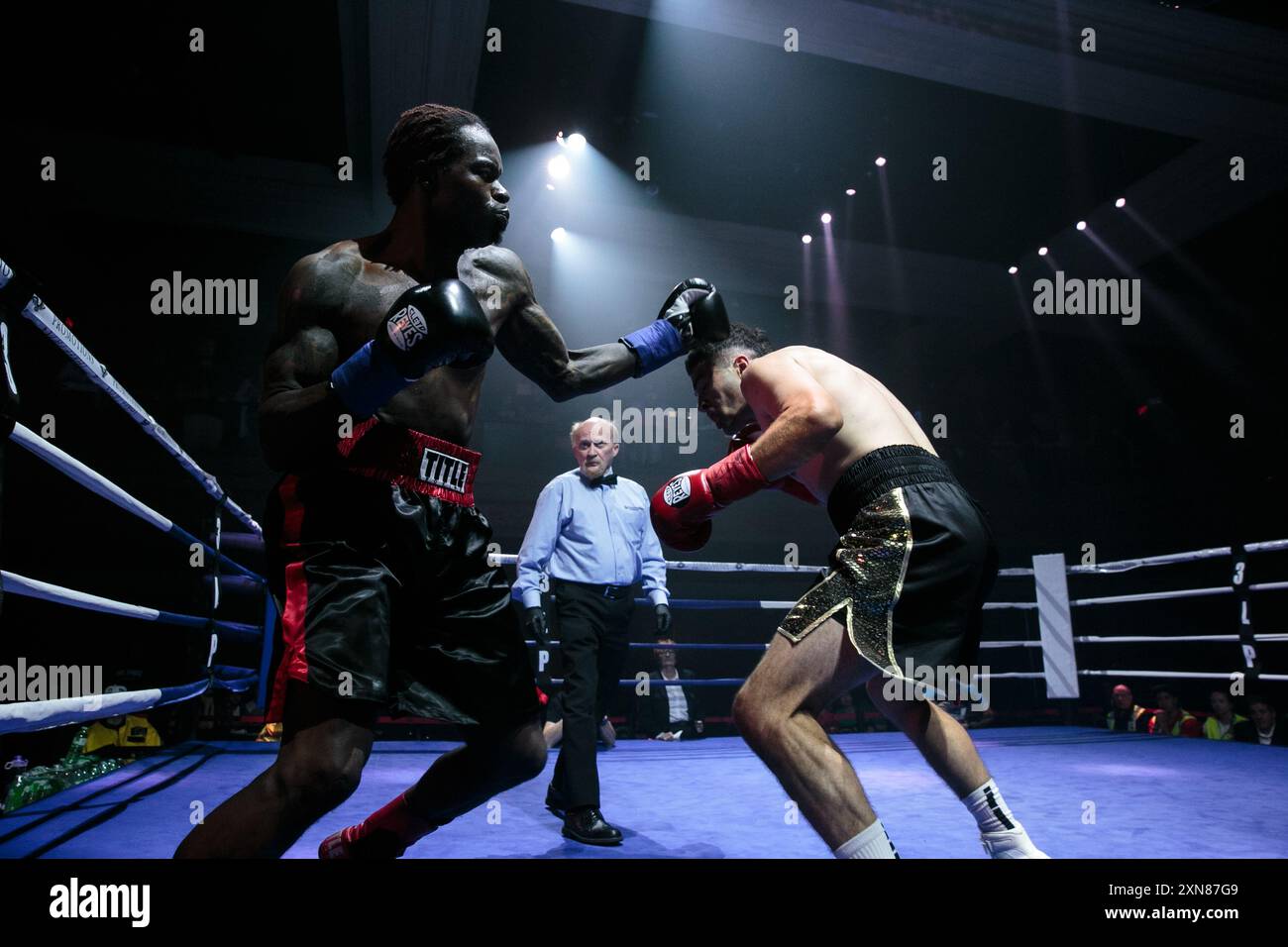 Antonia Scaringi (red gloves) faces Roddy Rene (black gloves) during a ...