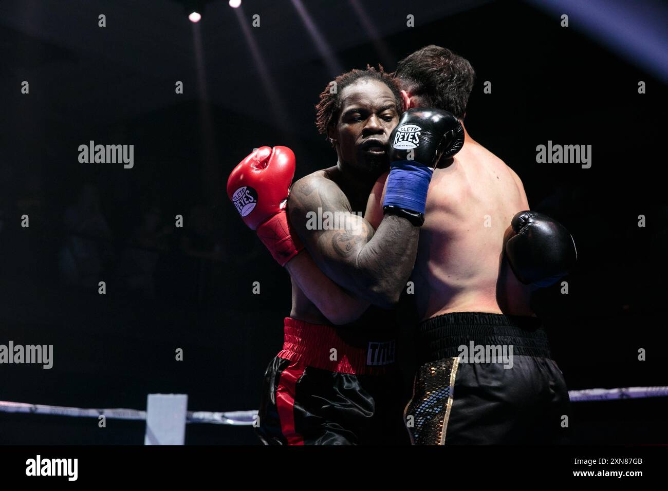 Antonia Scaringi (red gloves) faces Roddy Rene (black gloves) during a ...