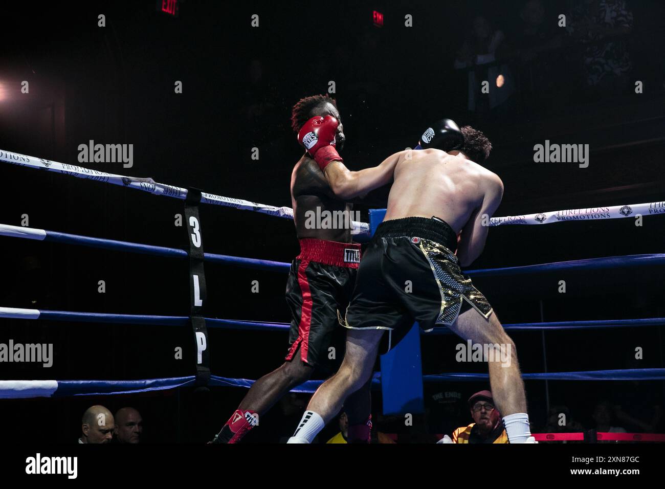 Antonia Scaringi (red gloves) faces Roddy Rene (black gloves) during a ...