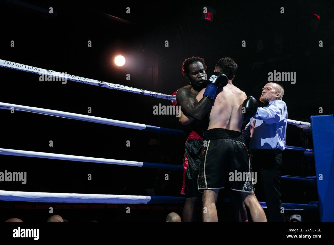 Antonia Scaringi (red gloves) faces Roddy Rene (black gloves) during a ...