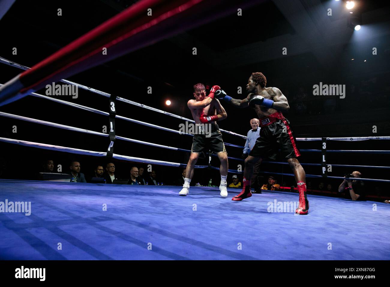 Antonia Scaringi (red gloves) faces Roddy Rene (black gloves) during a ...