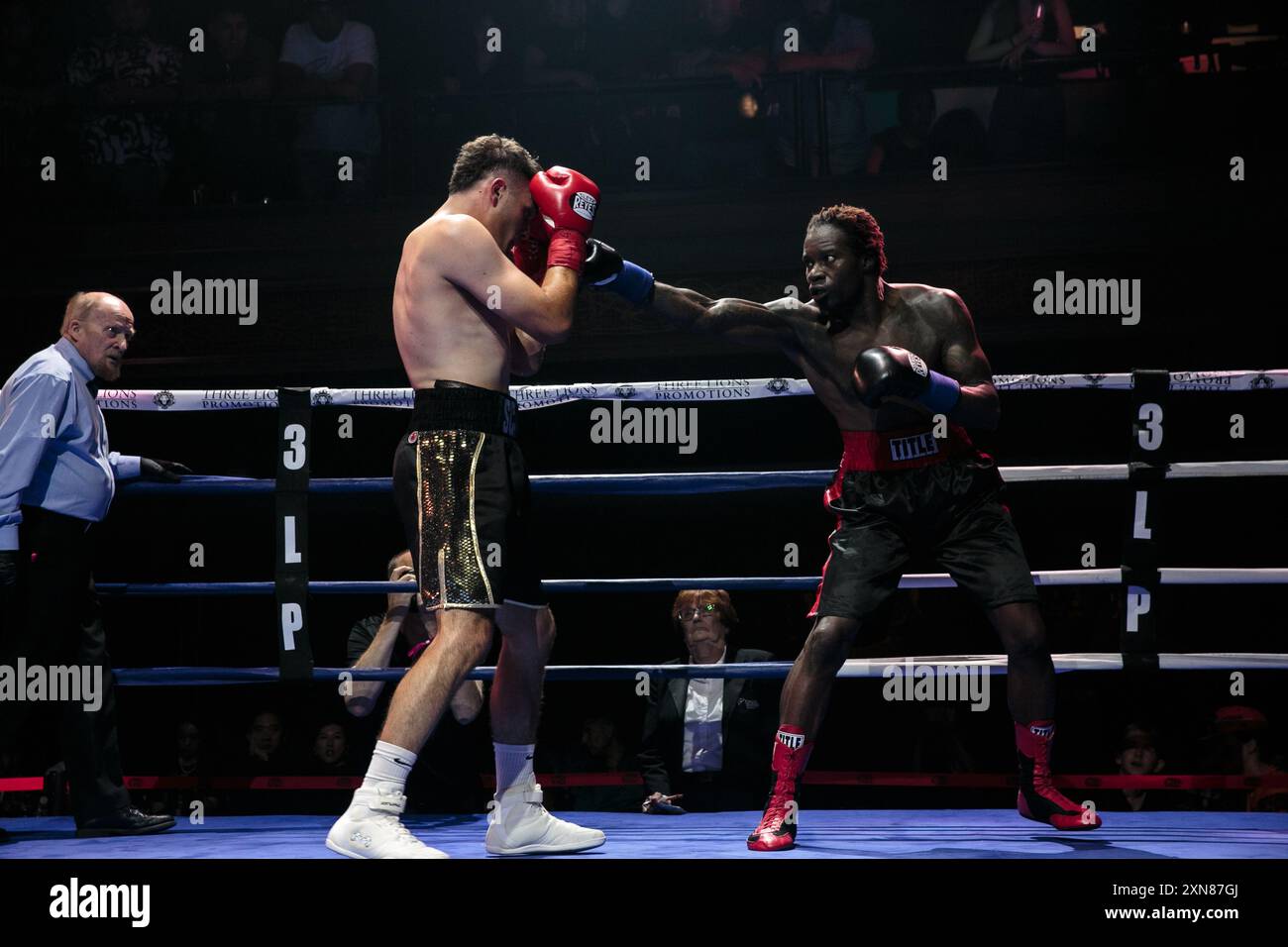 Antonia Scaringi (red gloves) faces Roddy Rene (black gloves) during a ...
