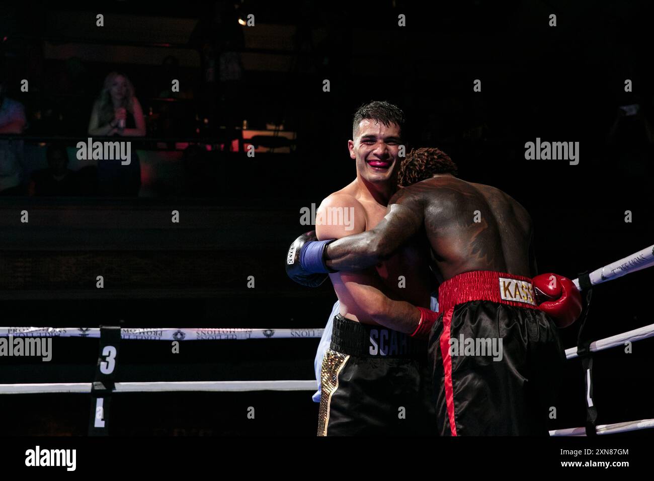 Antonia Scaringi (red gloves) faces Roddy Rene (black gloves) during a ...
