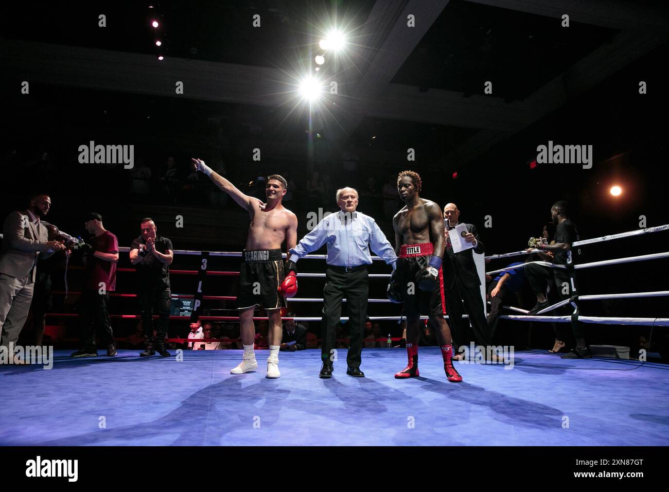 Antonia Scaringi (red gloves) faces Roddy Rene (black gloves) during a ...