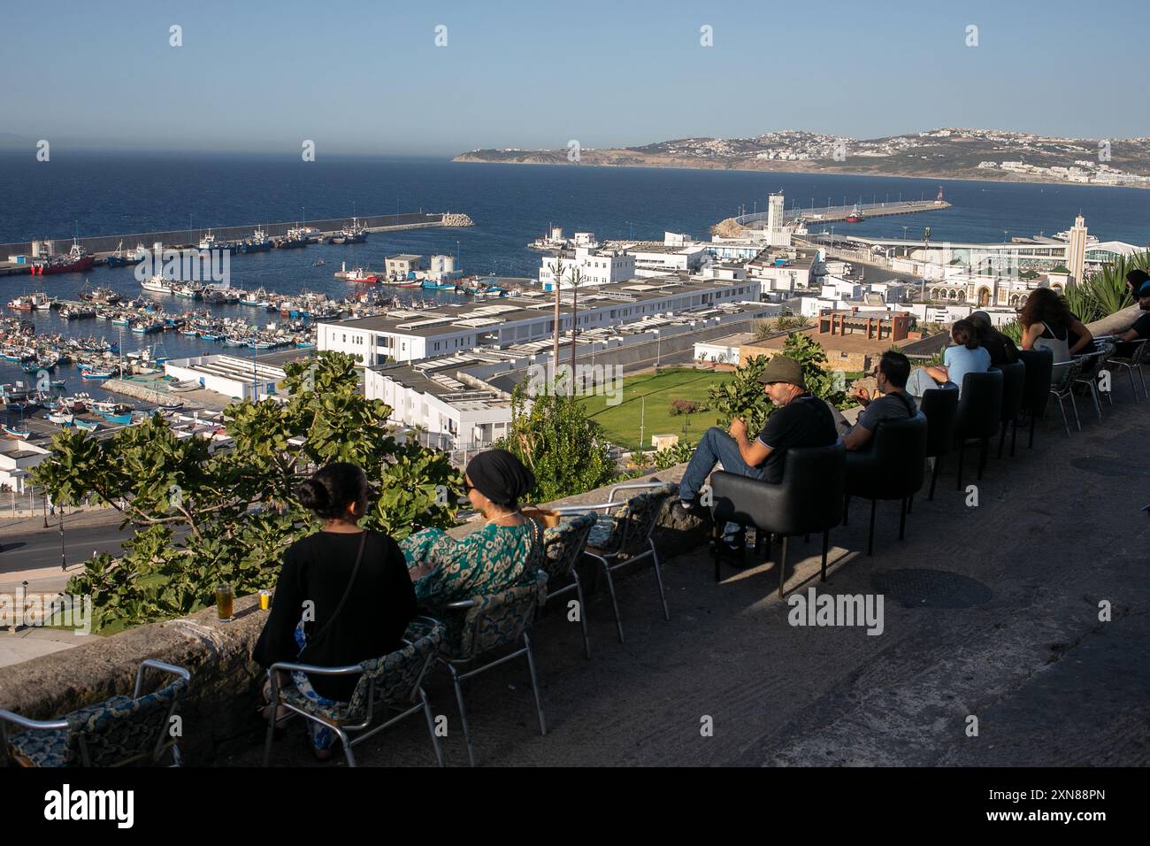 Tanger, Morocco. 27th July, 2024. A group of people enjoy a panoramic ...