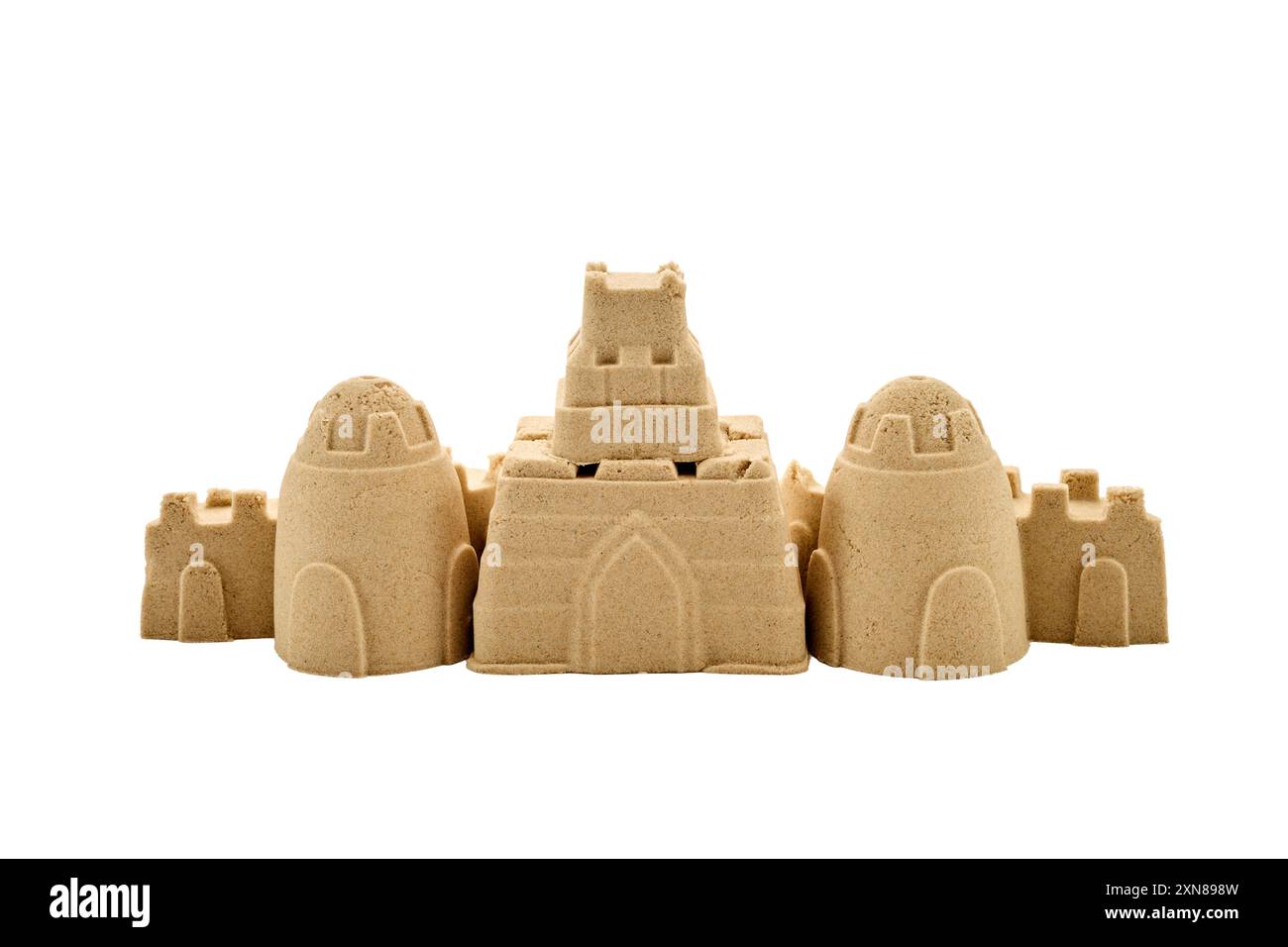 Sandcastle sculpture featuring various towers on a white background ...