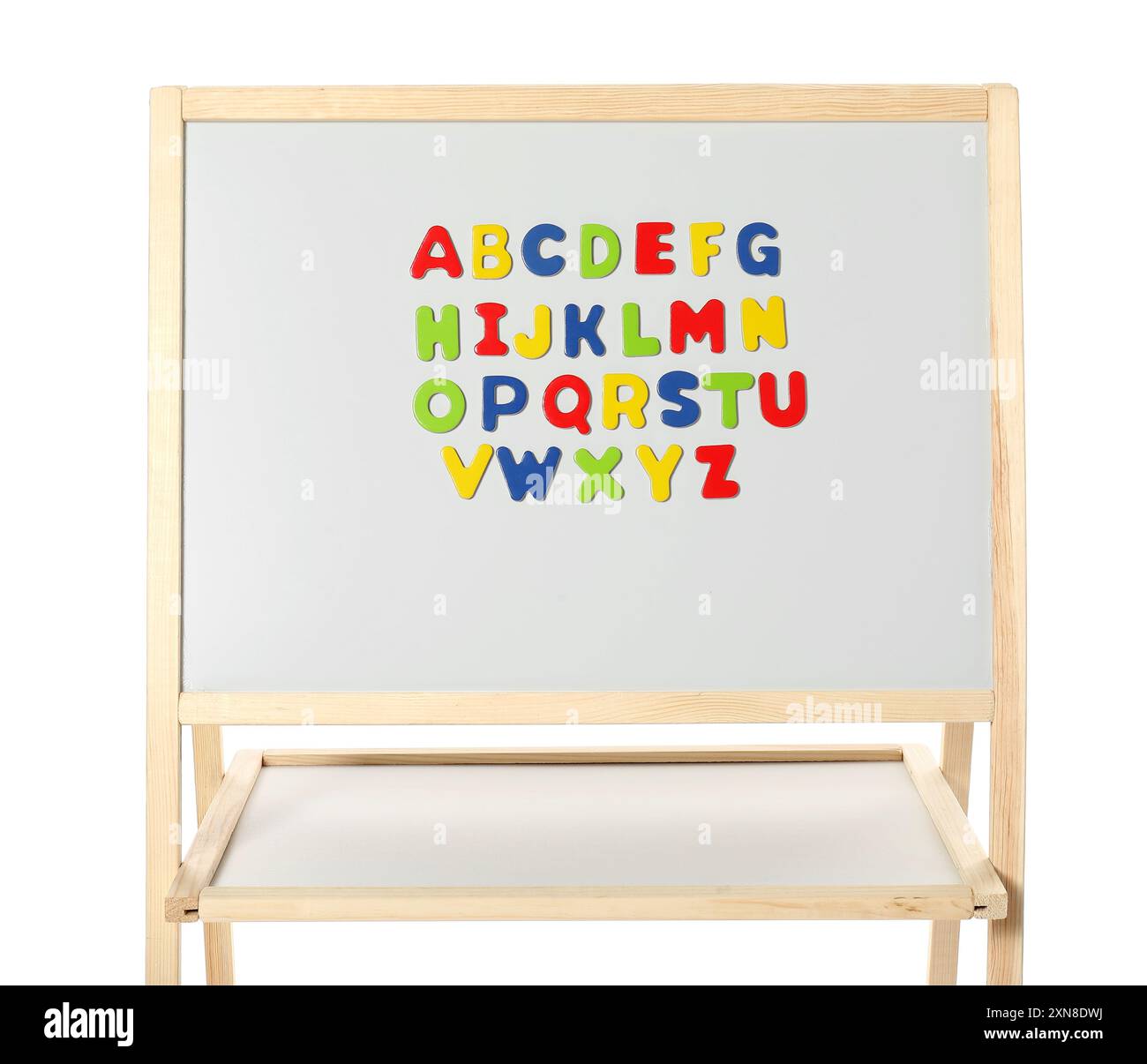 Alphabetical order. Magnetic letters on board against white background ...