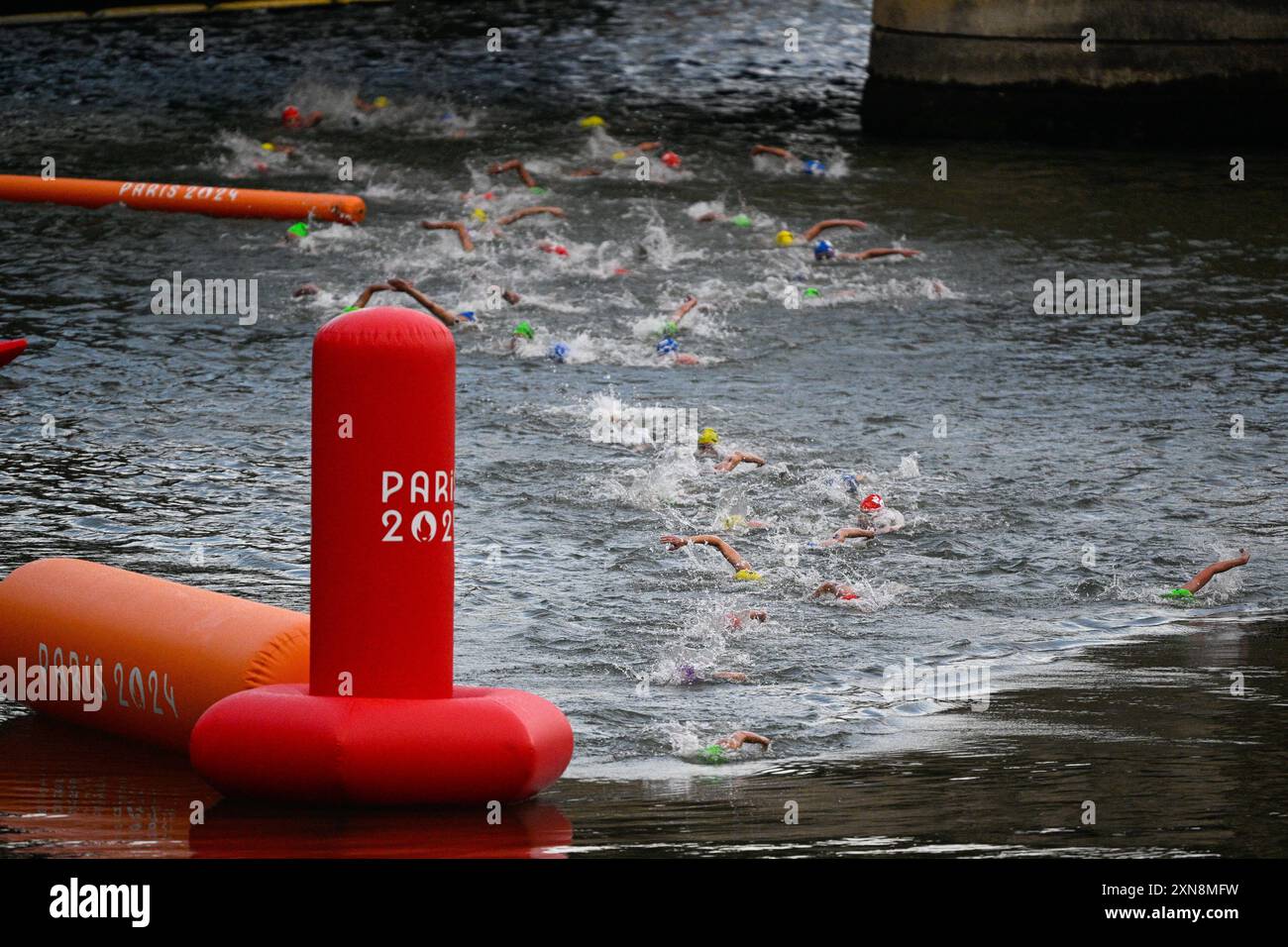 Paris, France. 31st July, 2024. Athletes swim in th Seine during the ...