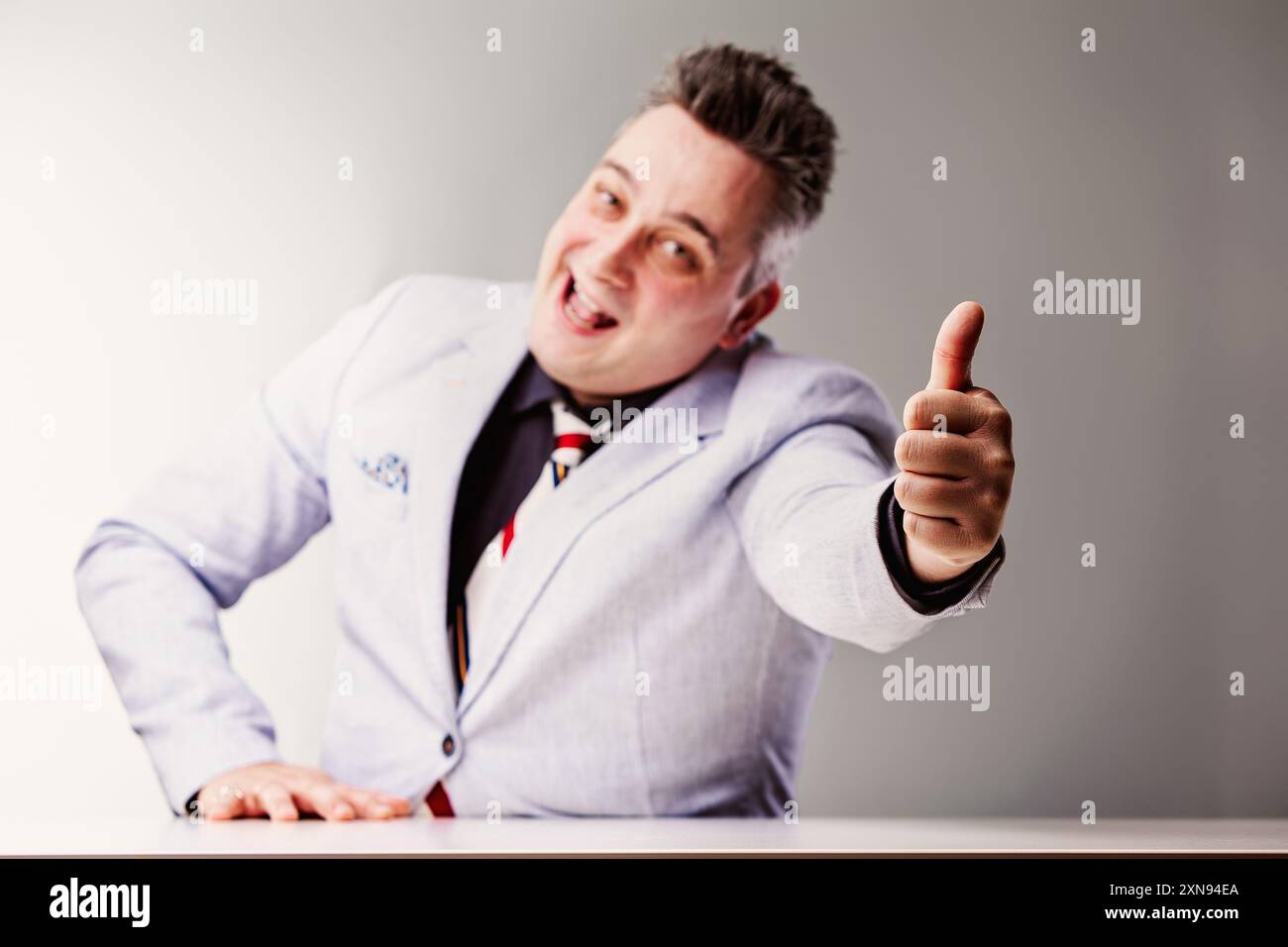 Salesman laughs deceptively with a thumbs up, warning of shady business ...