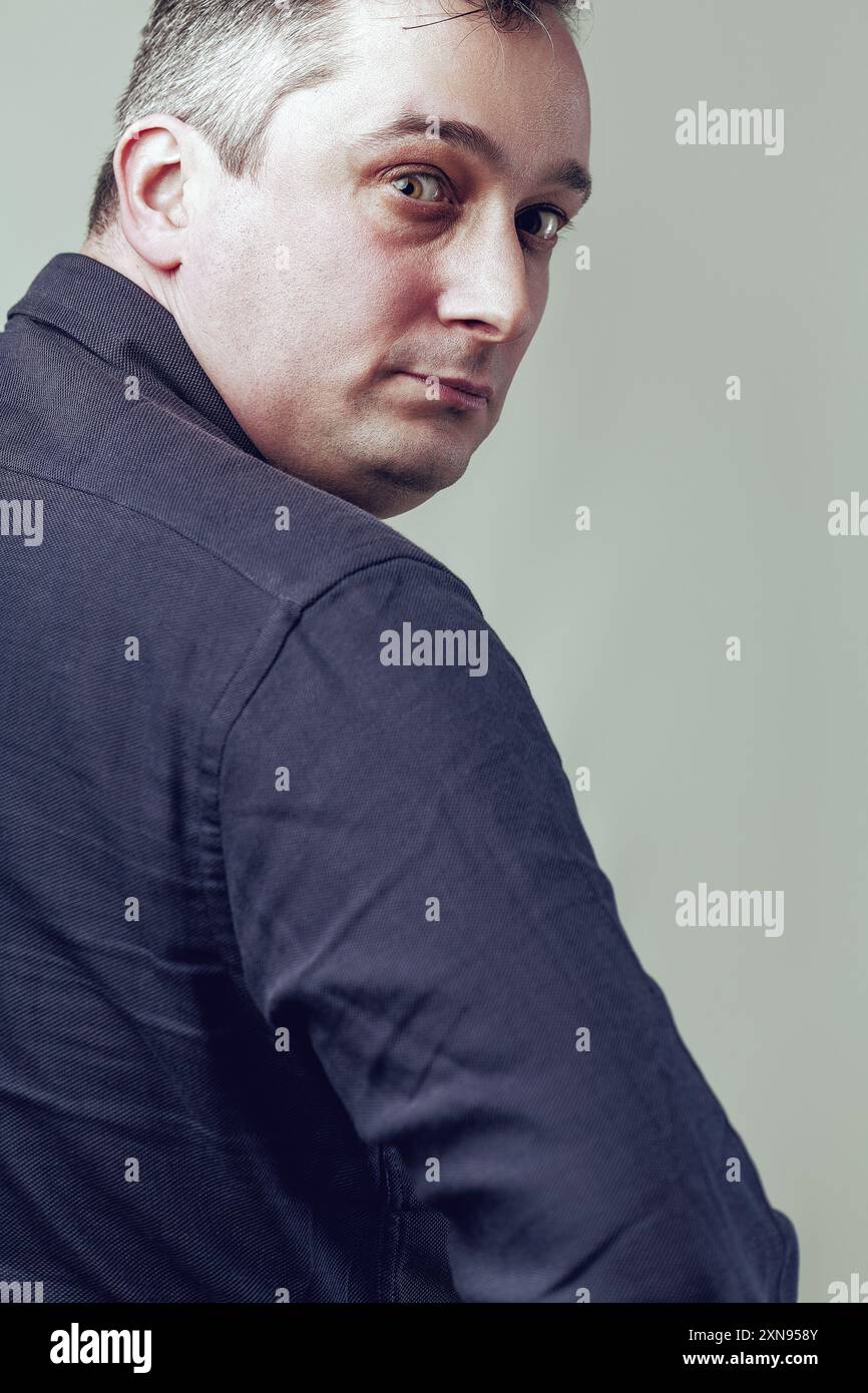 Professional businessman turning around looking hi-res stock ...