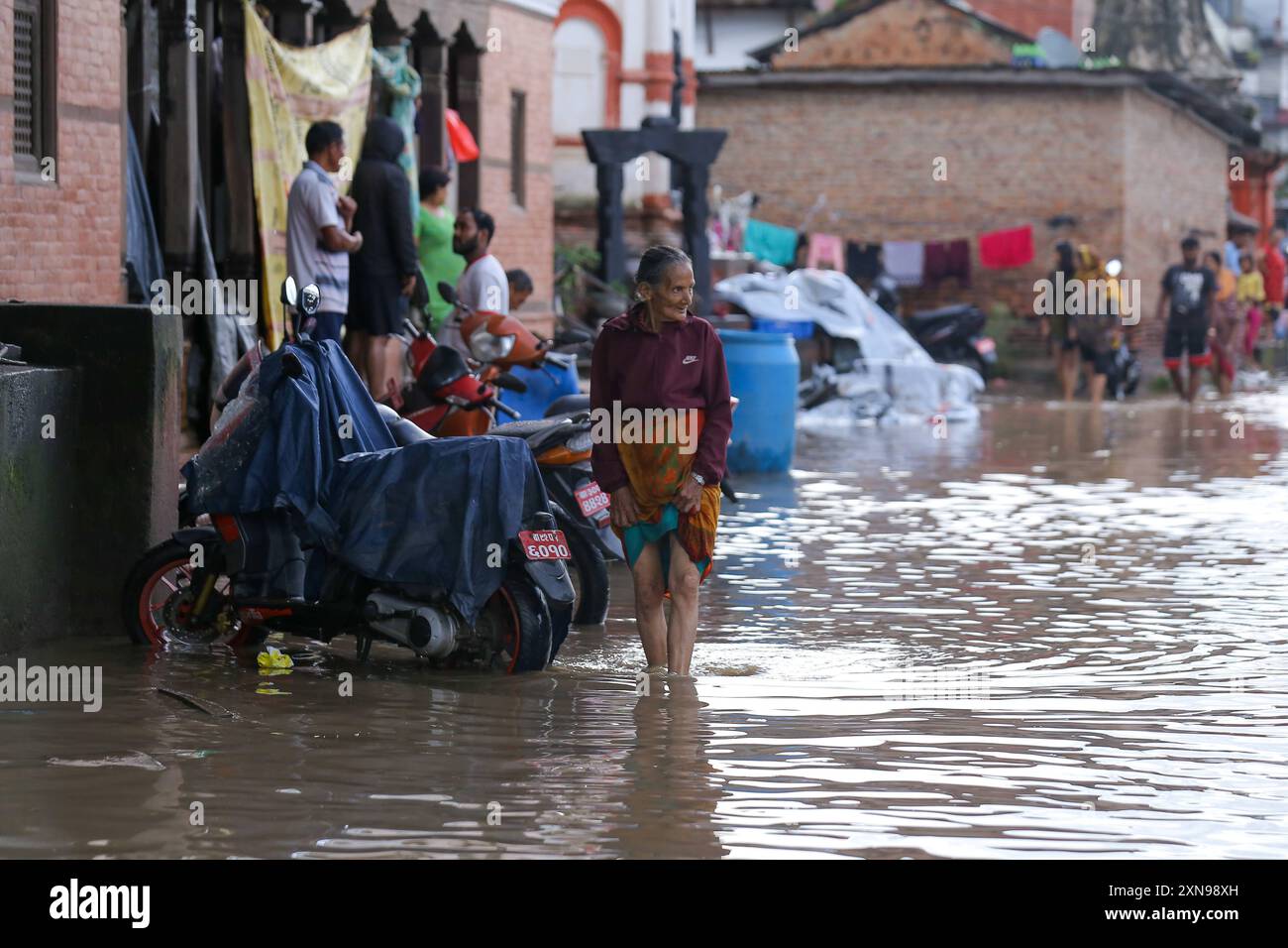 Heavy rain flood houses in Nepal People are wading through the flood in ...