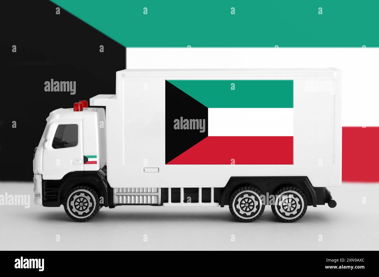 Kuwait flag depicted on side wall of white delivery van close up ...