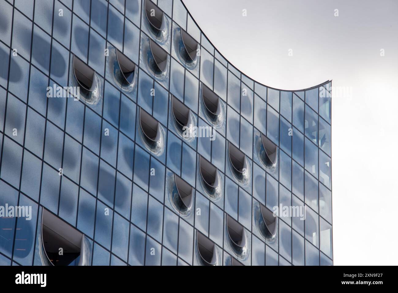 Detail of the glass facade of the spectacular stylish new Hamburg ...