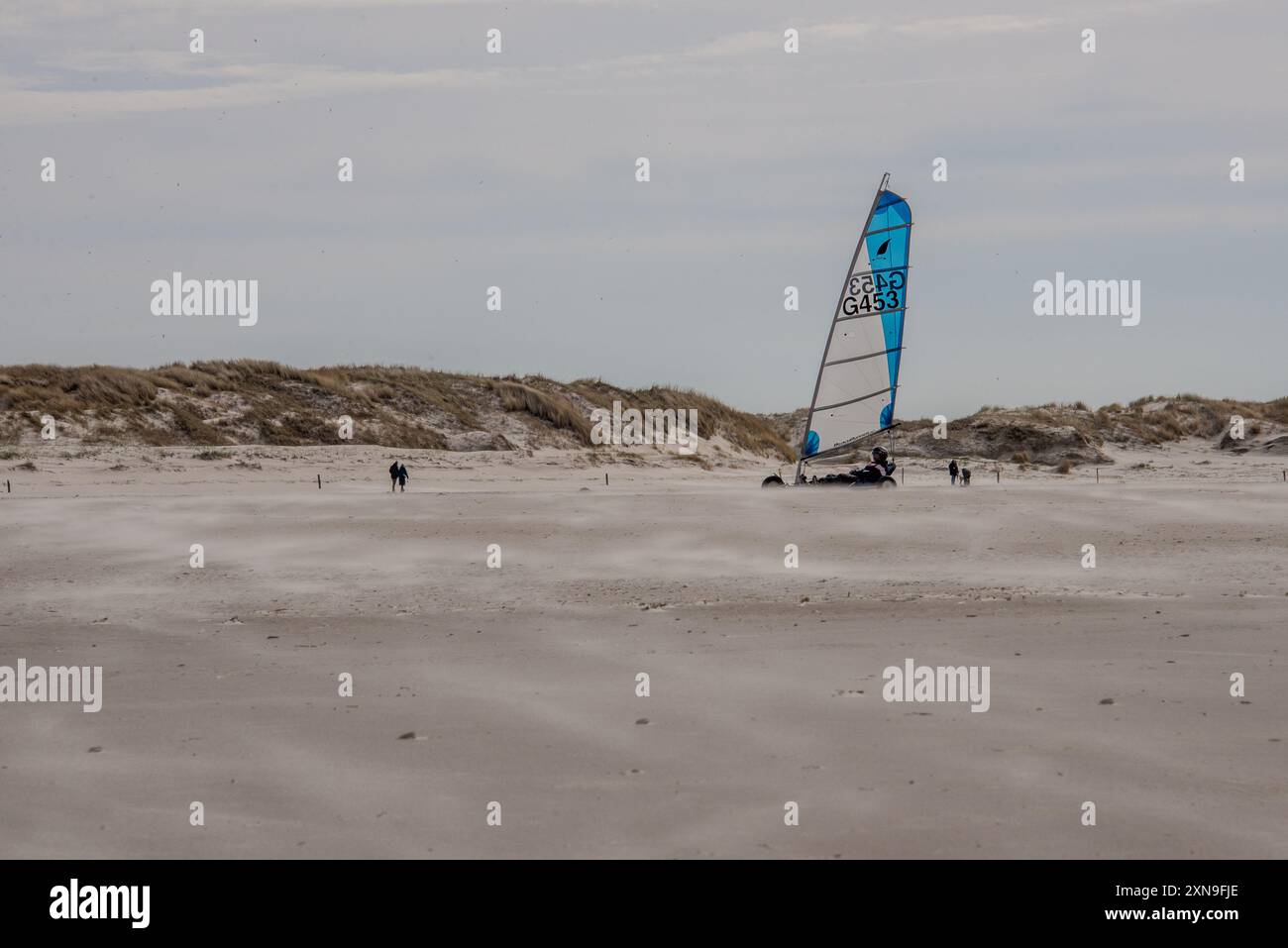 A land yacht racing over the flat sands of Sankt-Peter-Ording beach ...