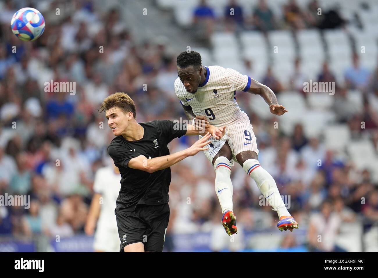 Arnaud Kalimuendo (France) and Tyler Bindon (New Zealand), Football ...