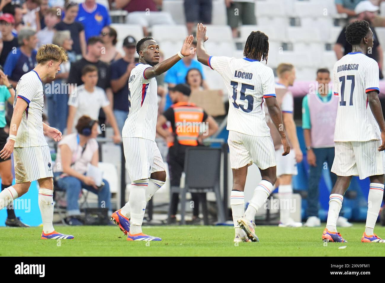 Arnaud Kalimuendo (France) celebrates a goal with Bradley Locko (France ...