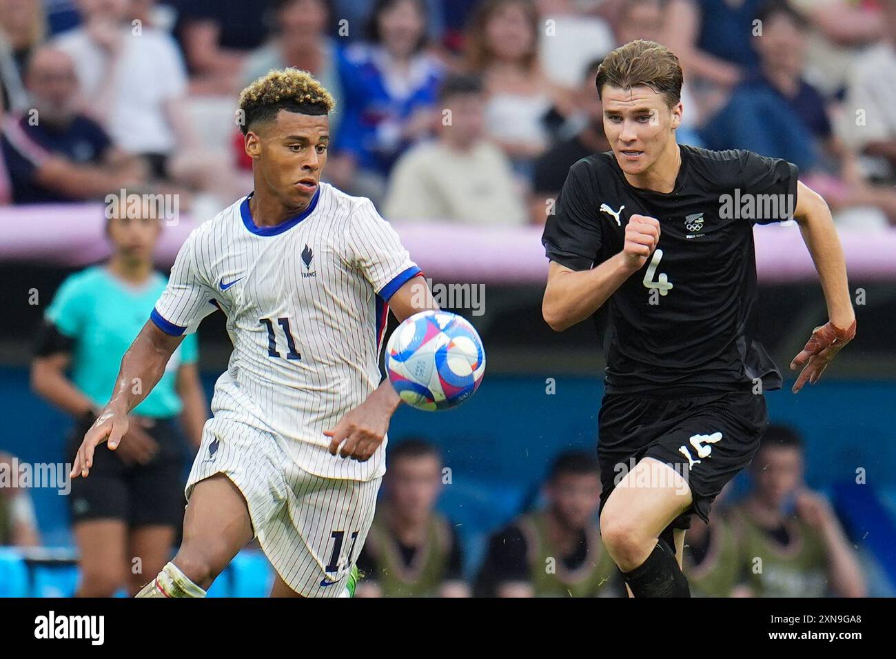 Desire Doue (France) and Tyler Bindon (New Zealand), Football, Men's ...