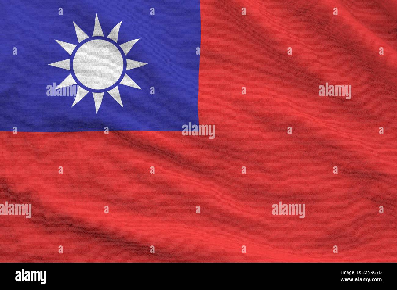 Taiwan flag depicted on folded wavy fabric of old cloth close up Stock ...