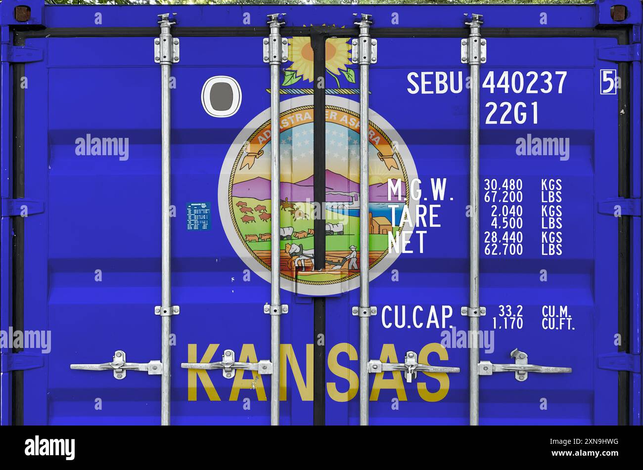 Kansas US state flag depicted on metal doors of shipping cargo ...
