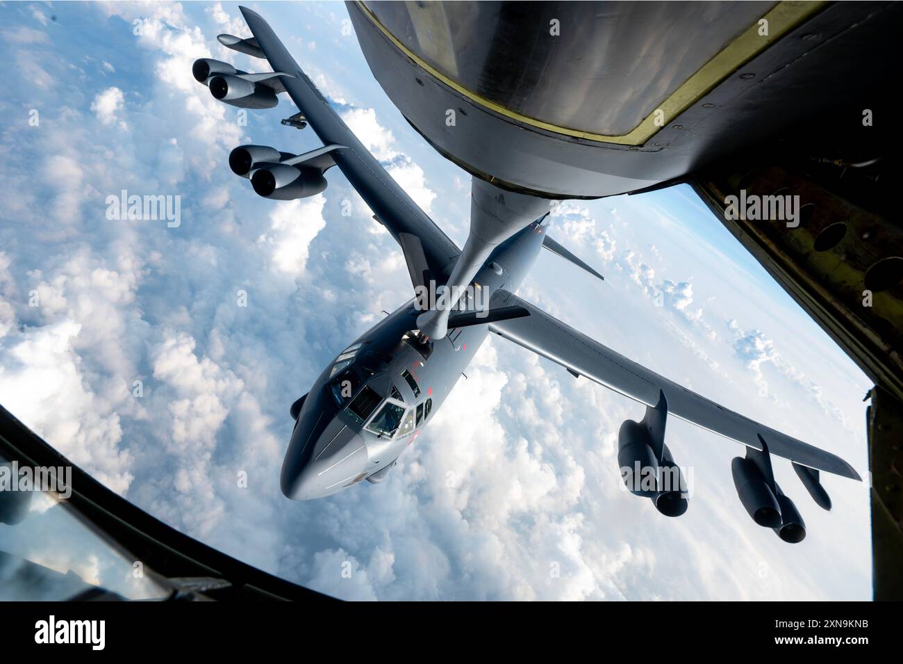 A U.S. Air Force KC-135 Stratotanker refuels a B-52 Stratofortress over ...
