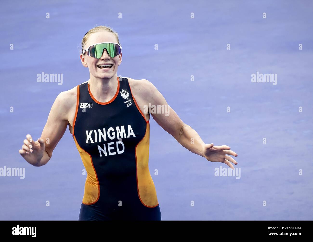 PARIS - Triathlete Maya Kingma crosses the finish line during the ...